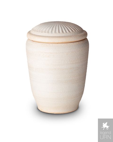 This beige biodegradable (sea) urn is manufactured from clay ...
